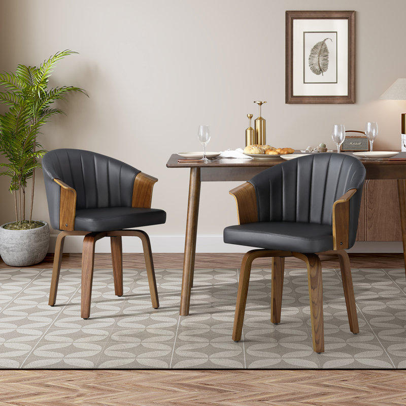 Wade Logan® Barrayo Faux Leather Swivel Dining Chair & Reviews | Wayfair